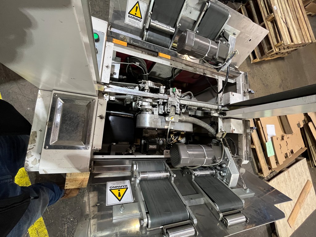 Used Dynaric DF-11A Fully Automatic Bottom Seal Strapping Machine