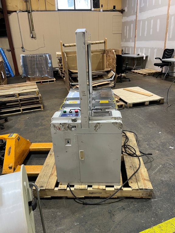 Used Dynaric DF-11A Fully Automatic Bottom Seal Strapping Machine