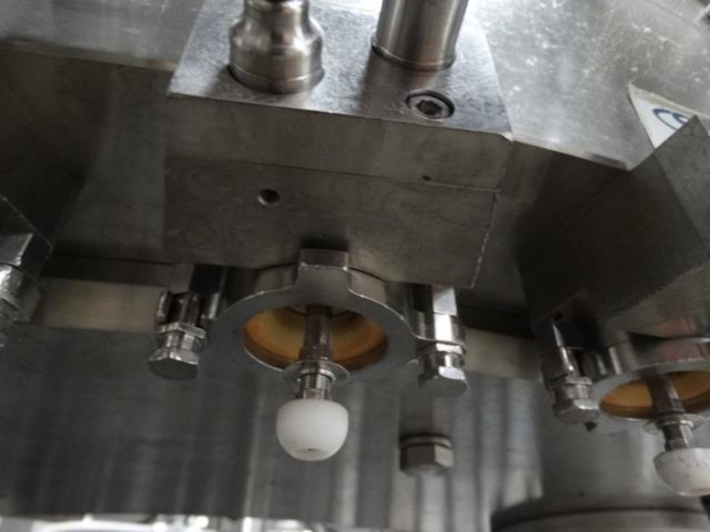 Used Crown Filler 52 Head Rotary Volumetric Filler